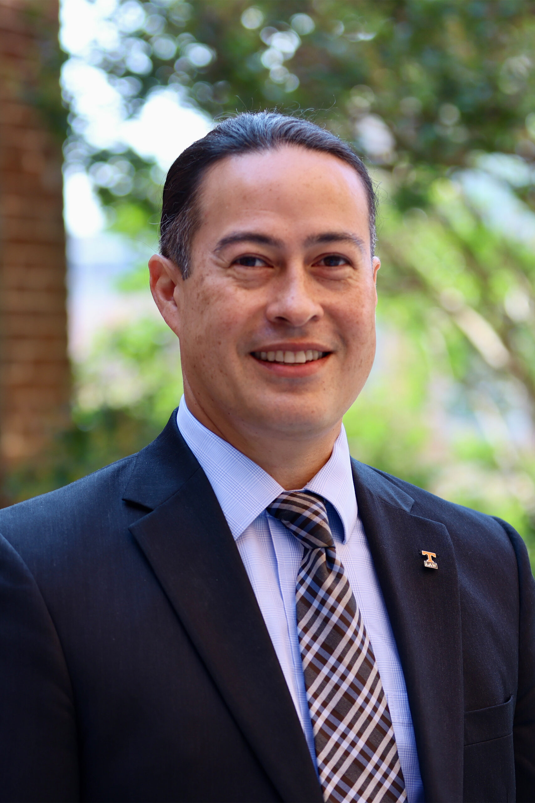 Carlos A. Yunsan - Winston College of Law